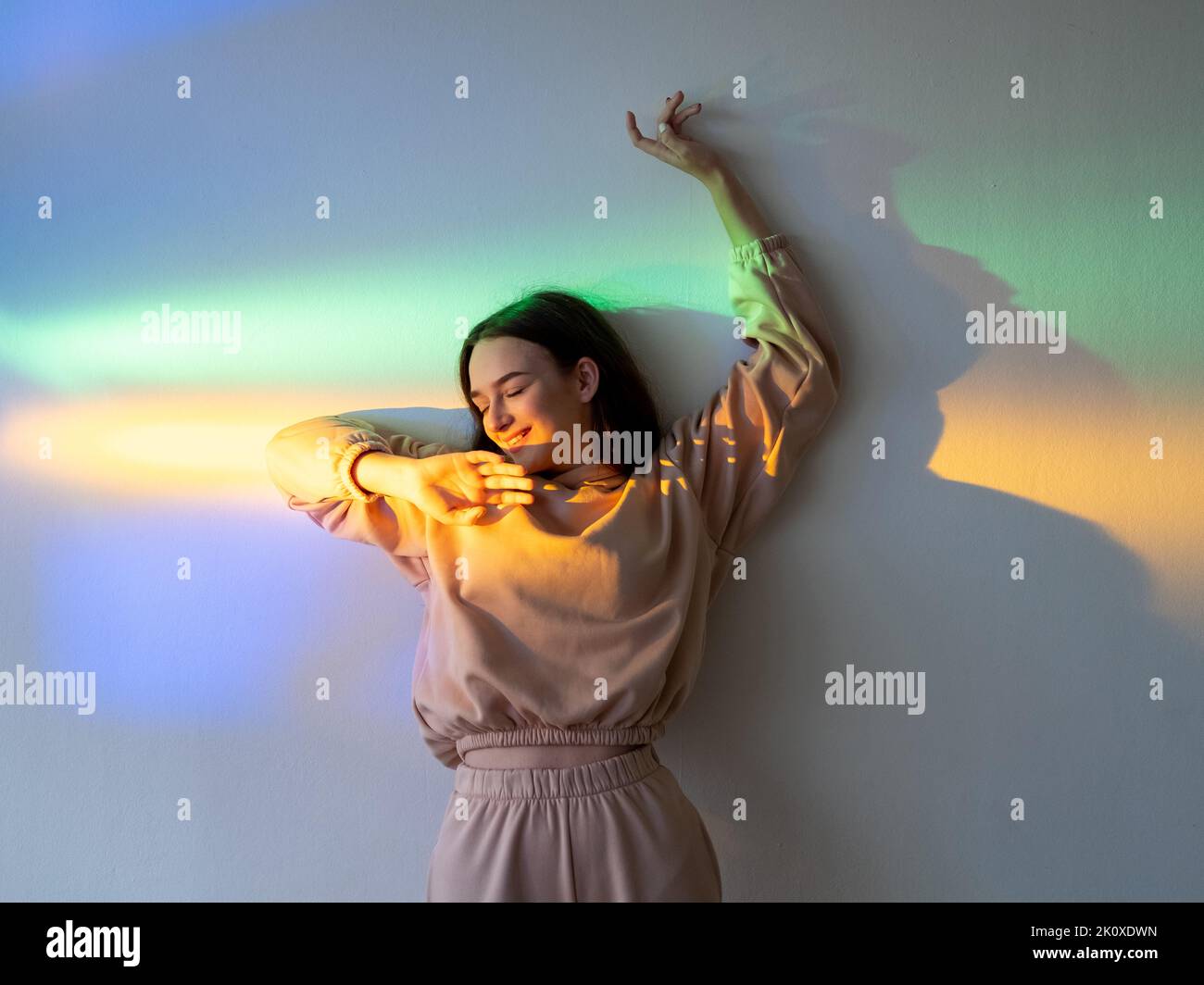 neon light woman positive lifestyle joy rainbow Stock Photo - Alamy