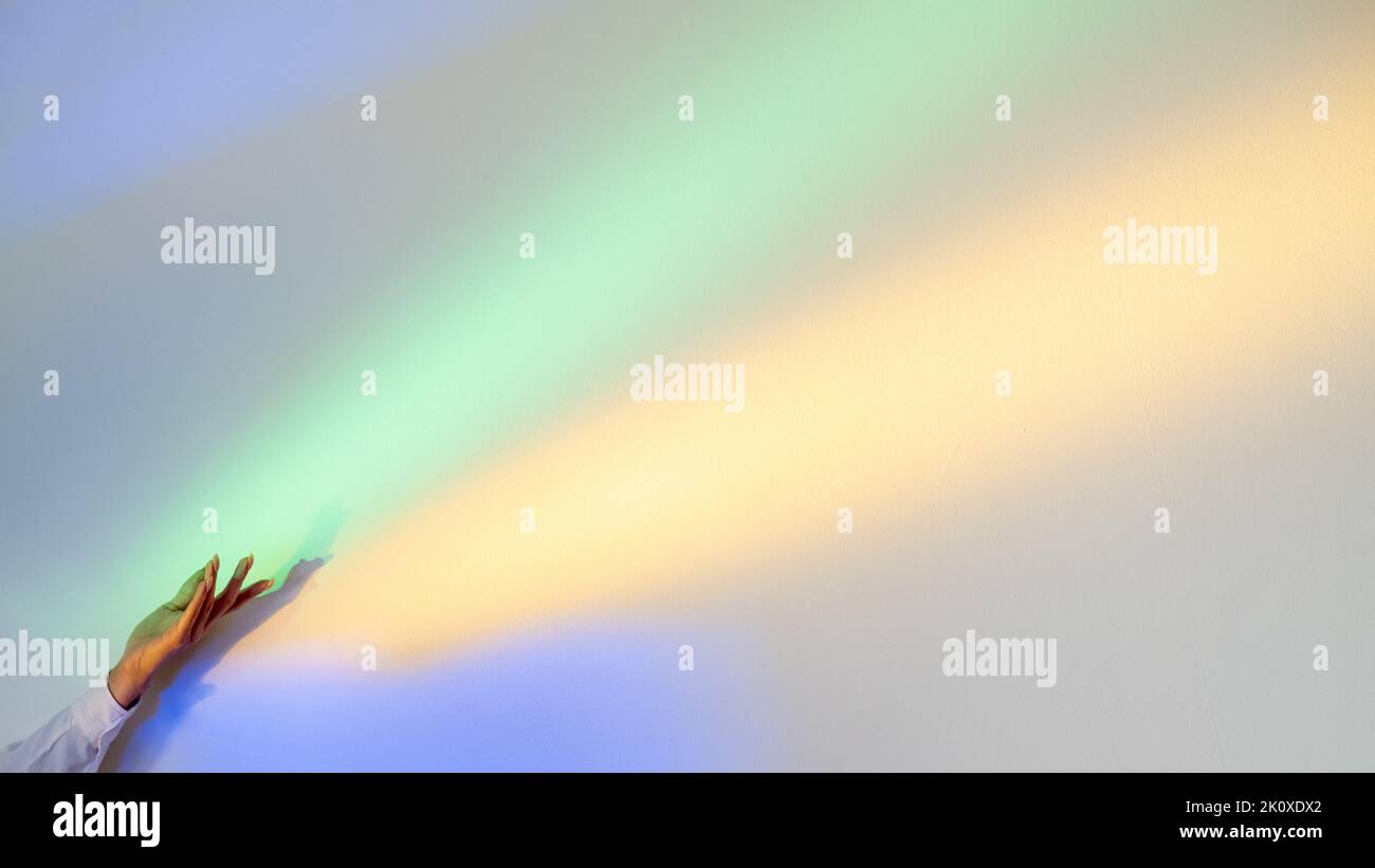 ethereal energy advertising background hand neon Stock Photo - Alamy