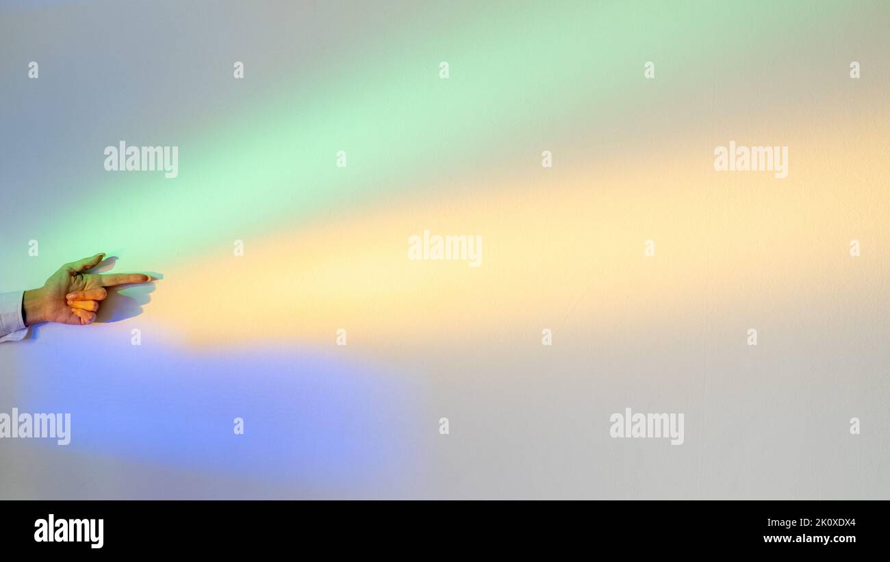 neon light background pointing gesture aura hand Stock Photo - Alamy