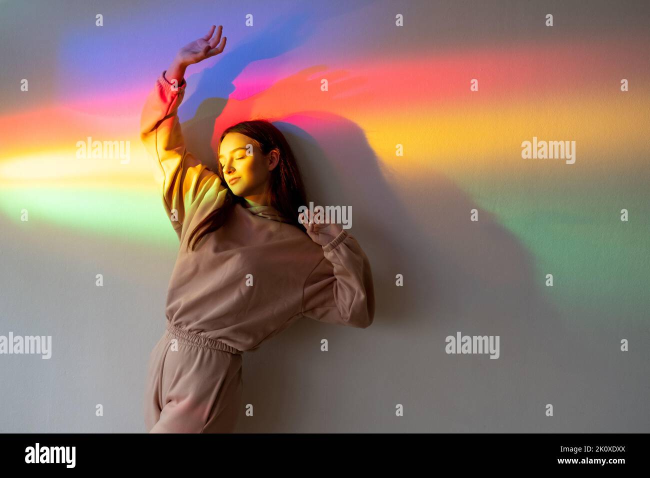 rainbow light female peace energy girl rainbow Stock Photo - Alamy