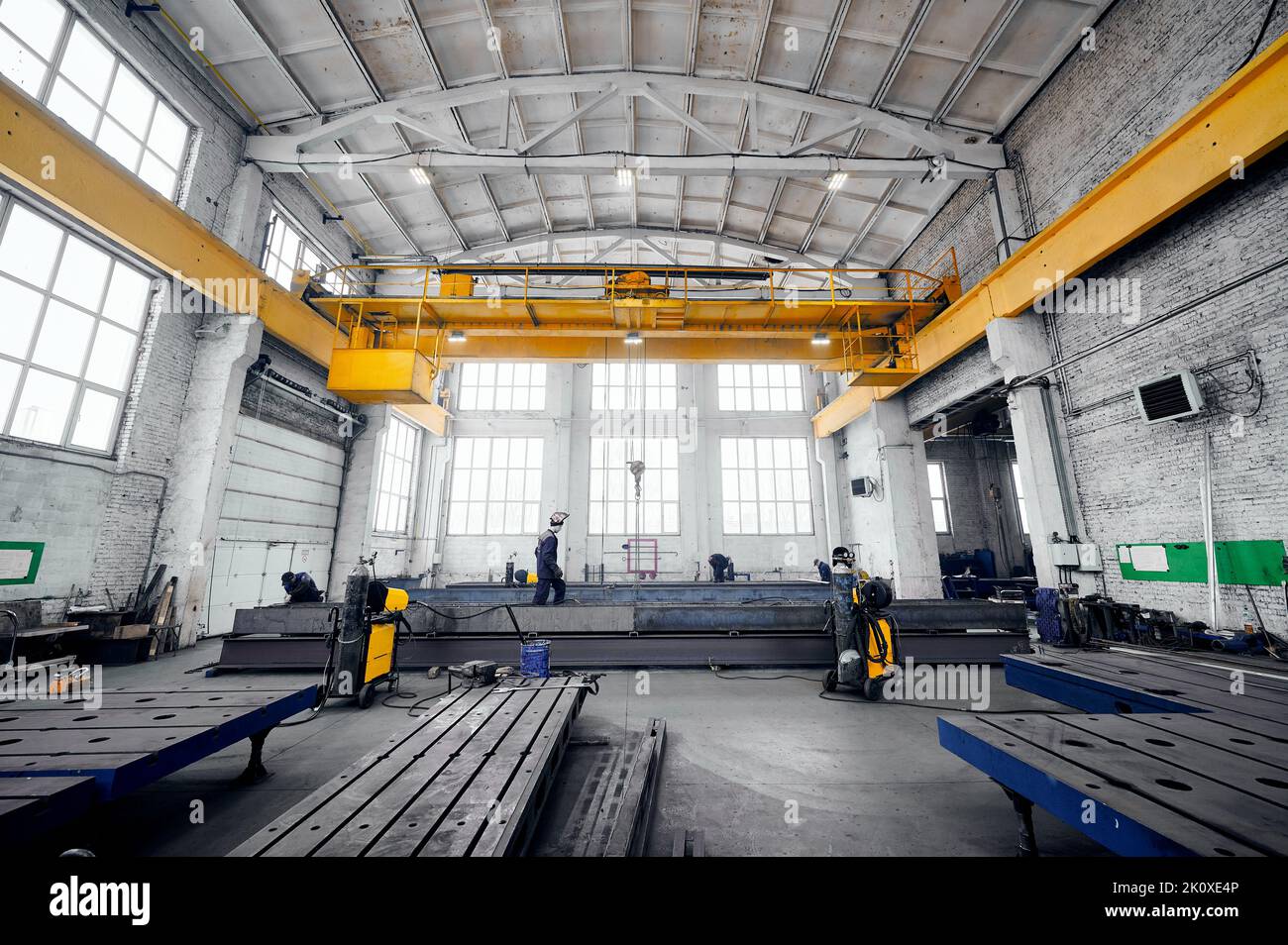 Long metal frames welding in assembling plant workshop Stock Photo - Alamy