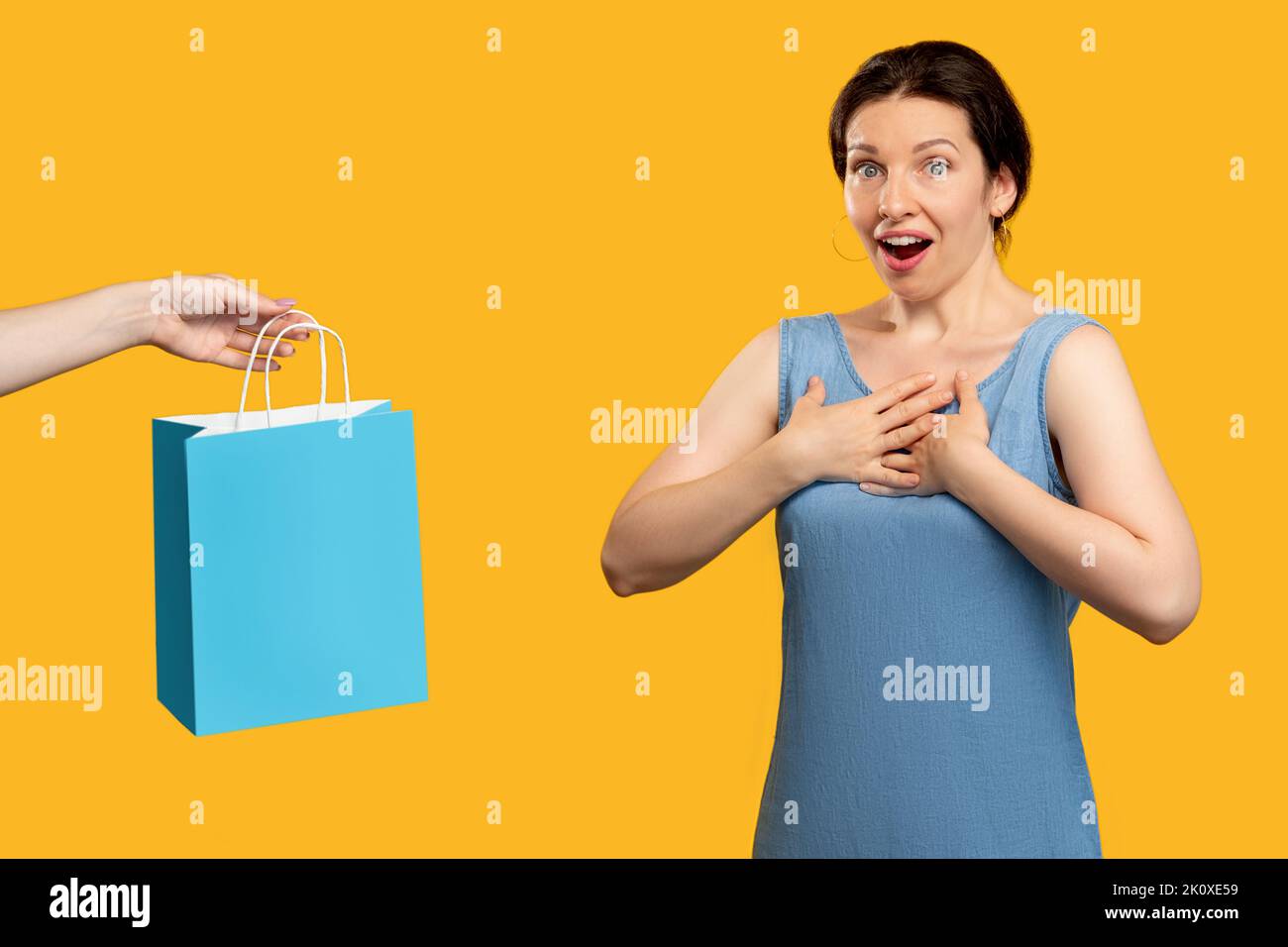holiday surprise unexpected gift excited woman Stock Photo - Alamy