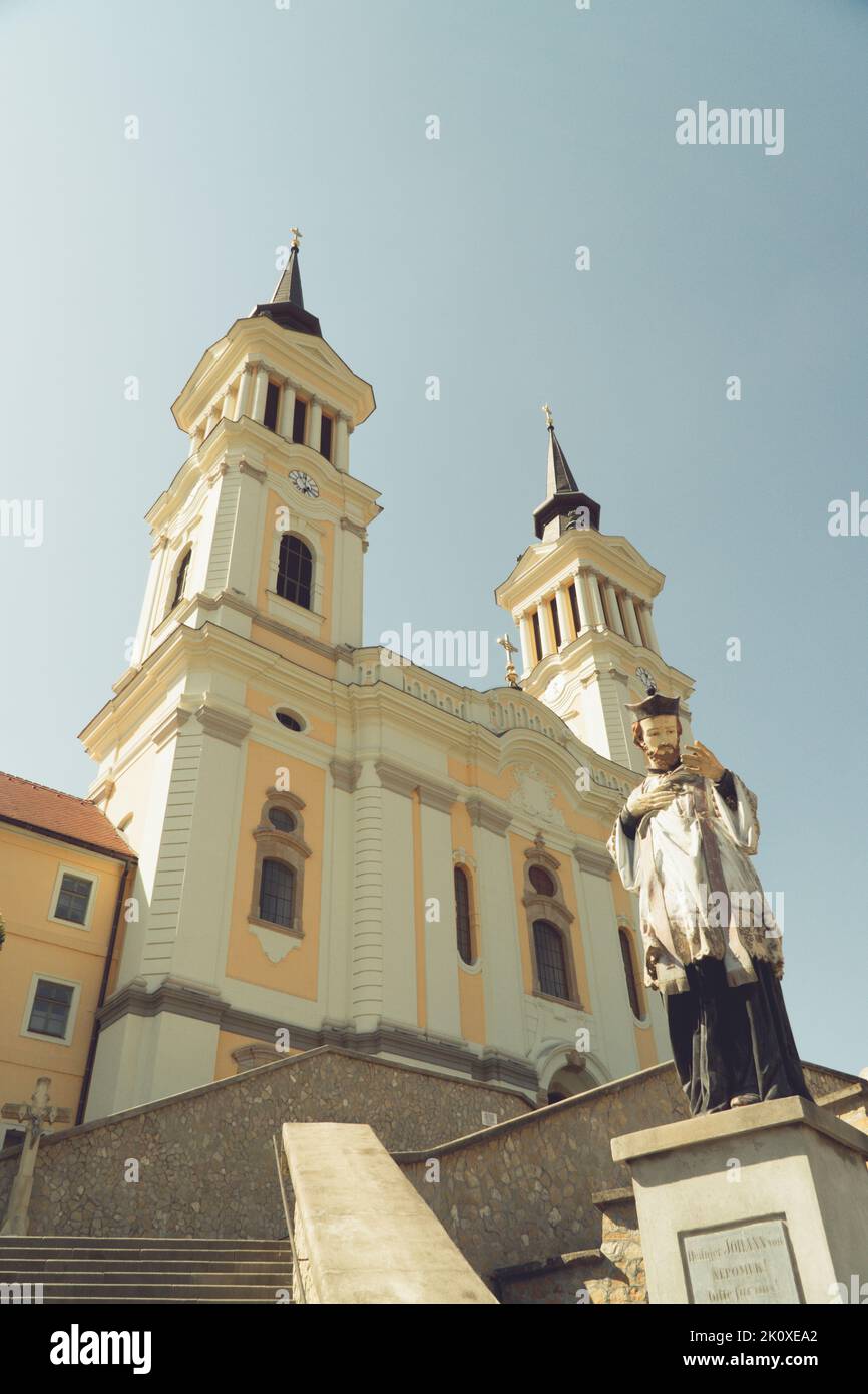 A low-angle vertical shot of St. Maria Radna Roman Catholic Monastery ...