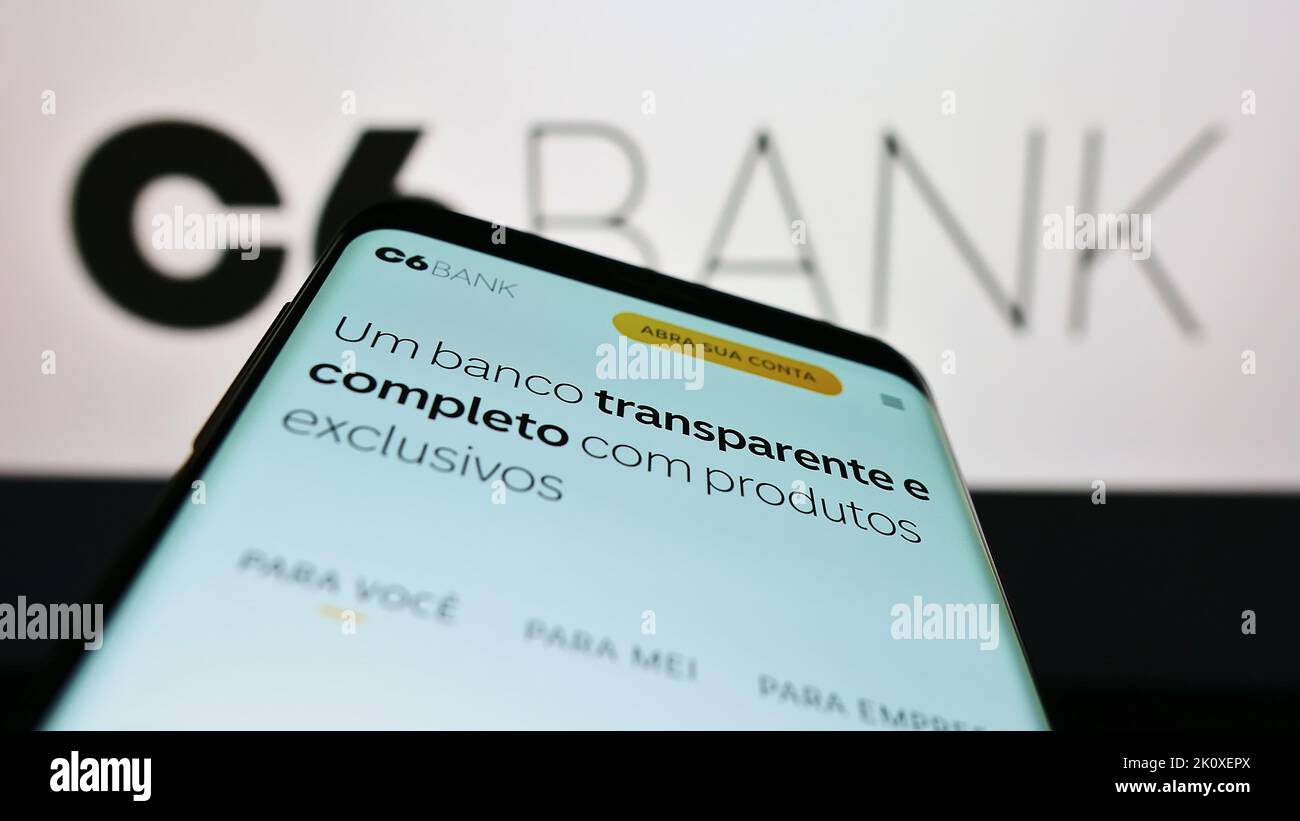 Mobile phone with website of Brazilian company BANCO C6 S.A. (C6 Bank ...