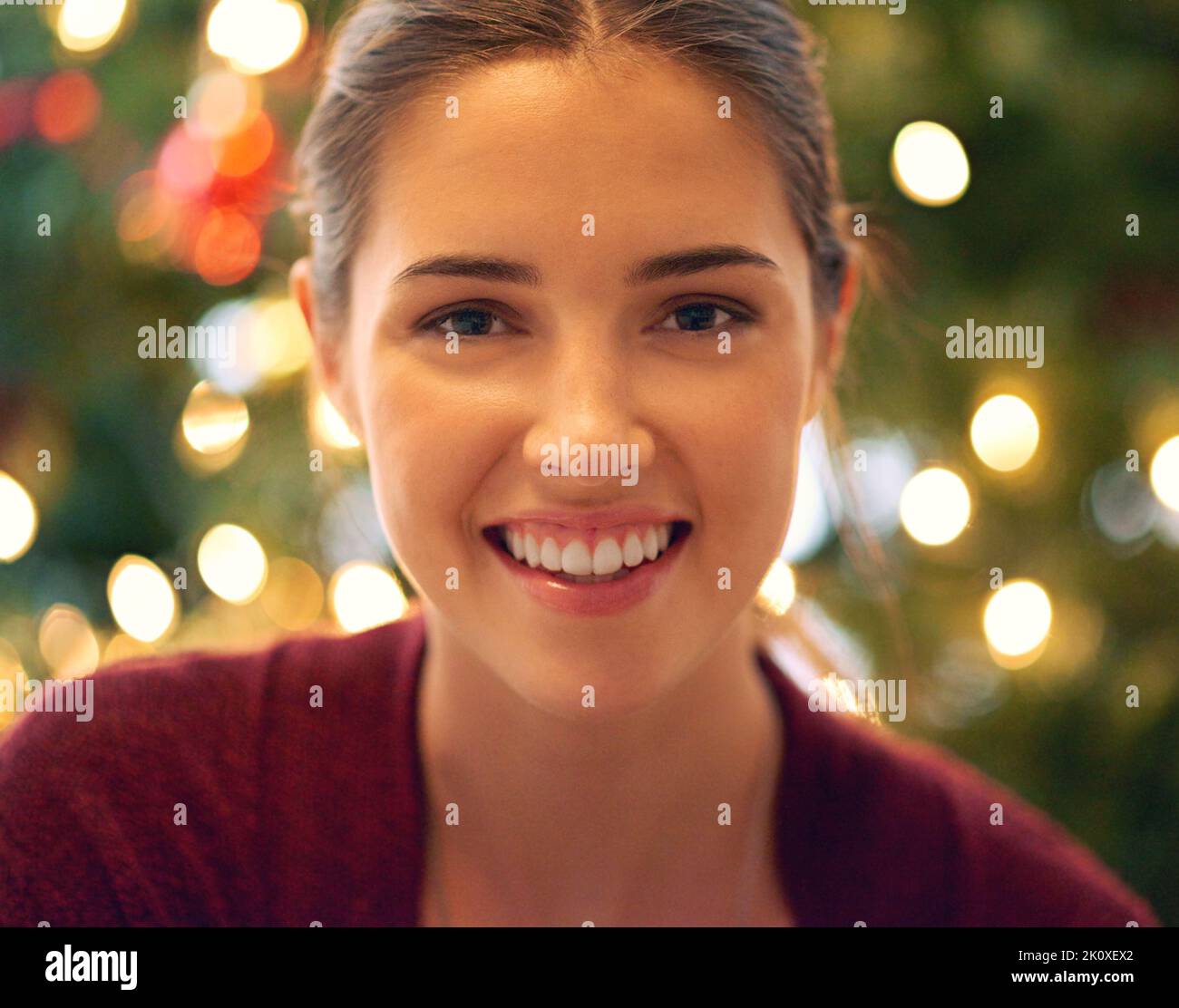 Christmas is my favorite time of year. Portrait of a beautiful young ...
