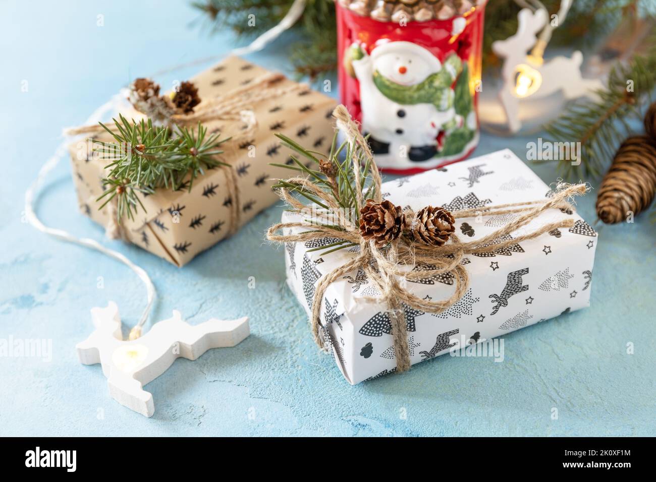 Christmas balls, winter fir tree with present boxs and christmas decor ...