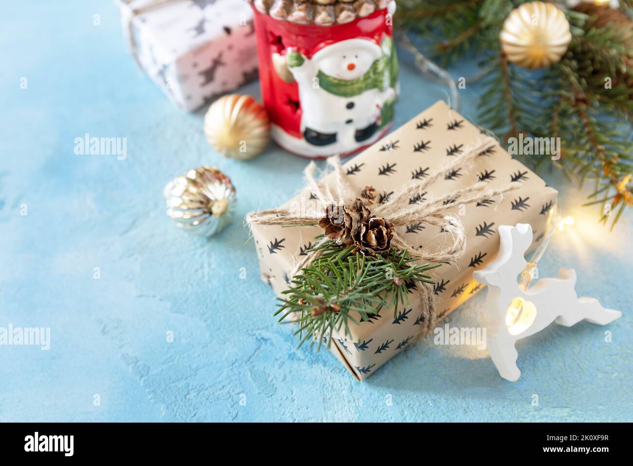 Christmas balls, winter fir tree with present boxs and christmas decor ...