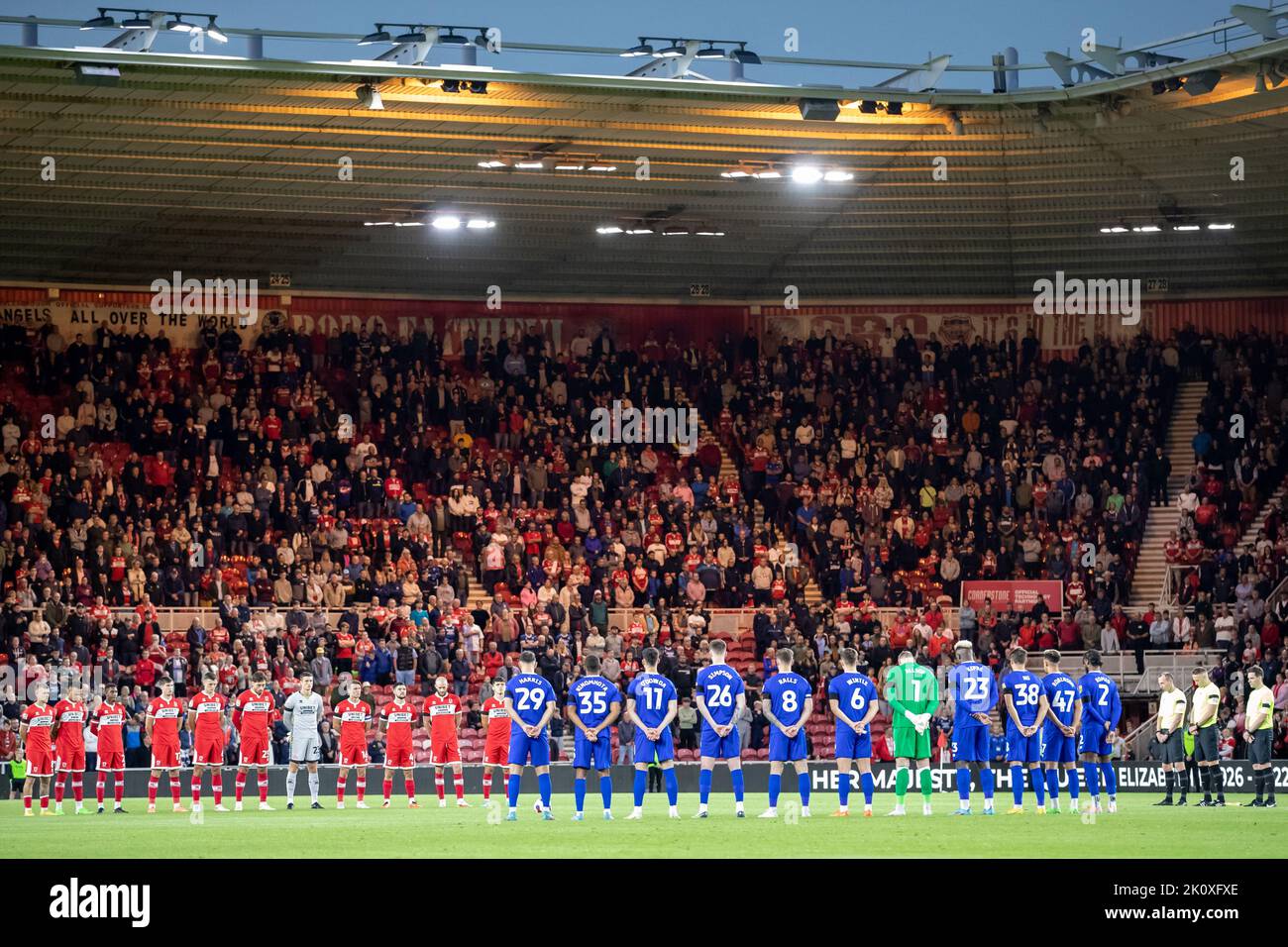 Players and fans observe one minute of silence in memory of Her Majesty ...