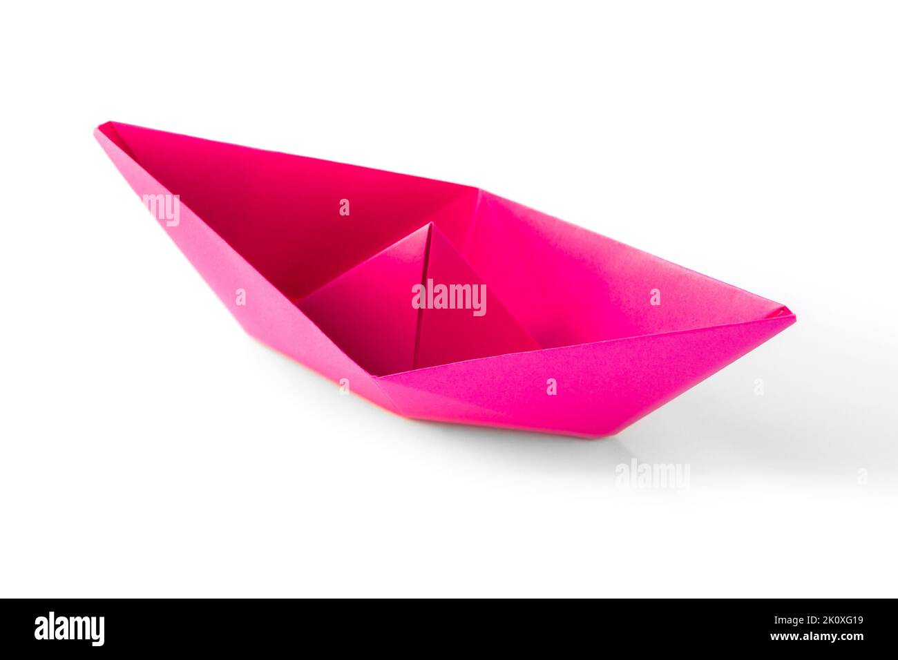 Pink paper boat origami isolated on a blank white background Stock ...