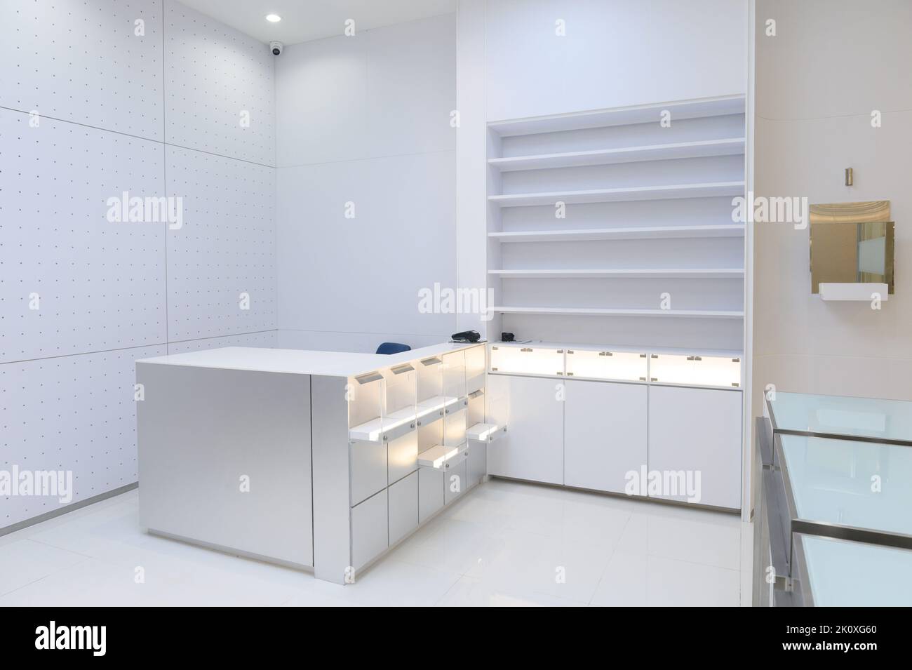 Interior of empty room with shelves Stock Photo - Alamy