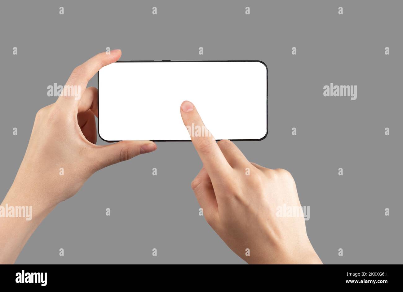 Hands holding phone mockup in horizontal position. Woman clicking ...