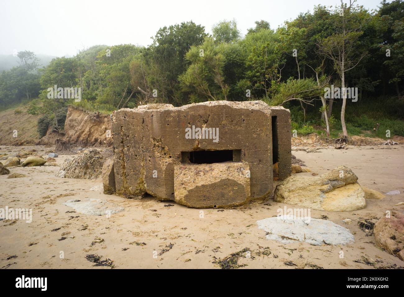 Broken WWII pillbox defence box on Cayton beach in North Yorkshire ...