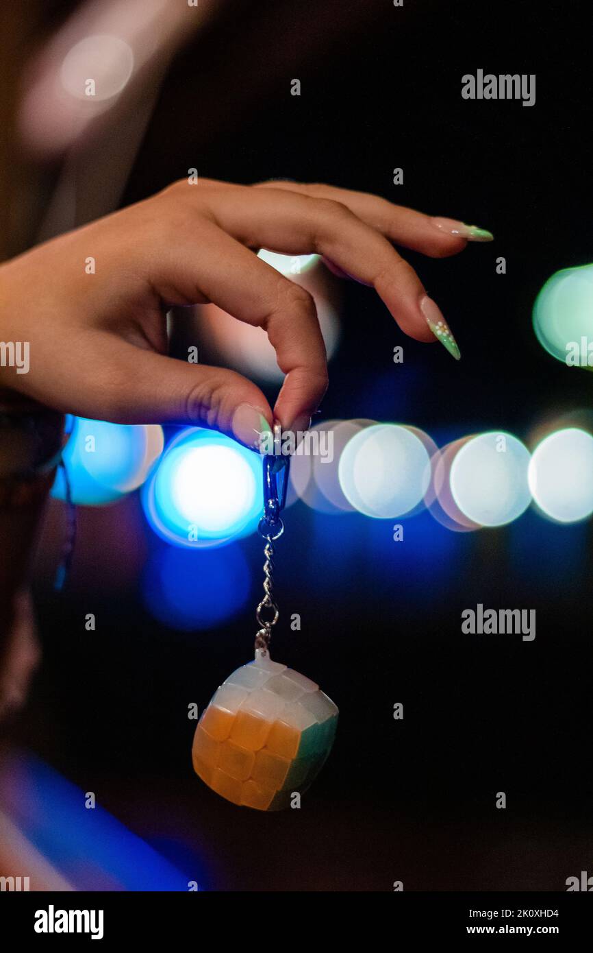 Rubiks cube in hand hi-res stock photography and images - Alamy
