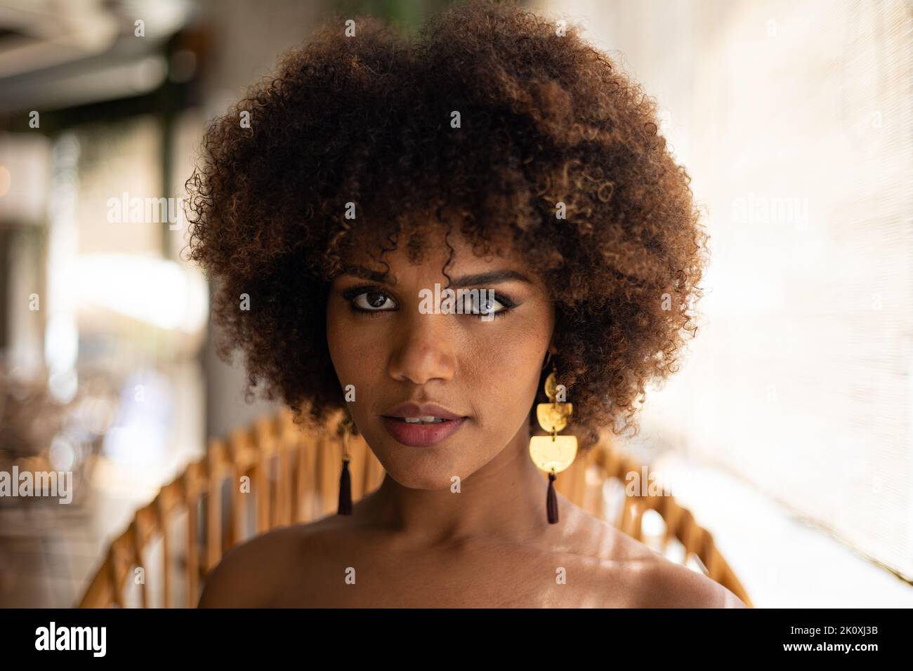 Beautiful young african woman hi-res stock photography and images - Alamy