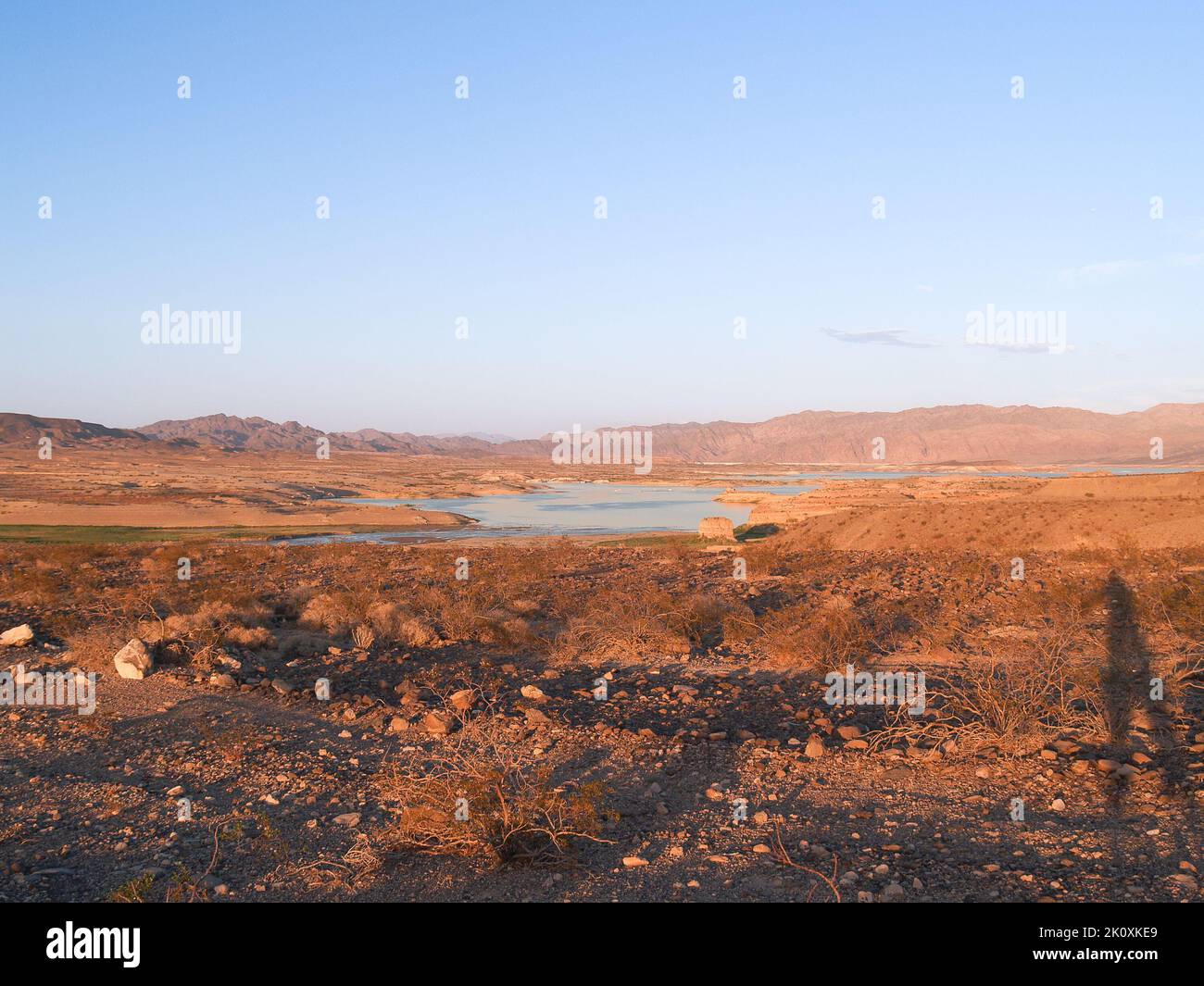 Lake mead, water reservoir surrounded by desert land and landforms in ...