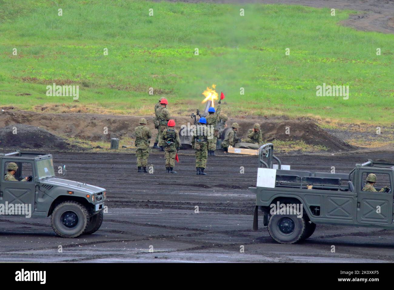 Japan Ground Self-Defense Force soldiers fire 120 mm mortar systems ...