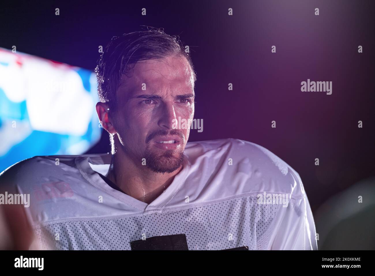 American Football Field: Lonely Athlete Warrior Standing on a Field ...
