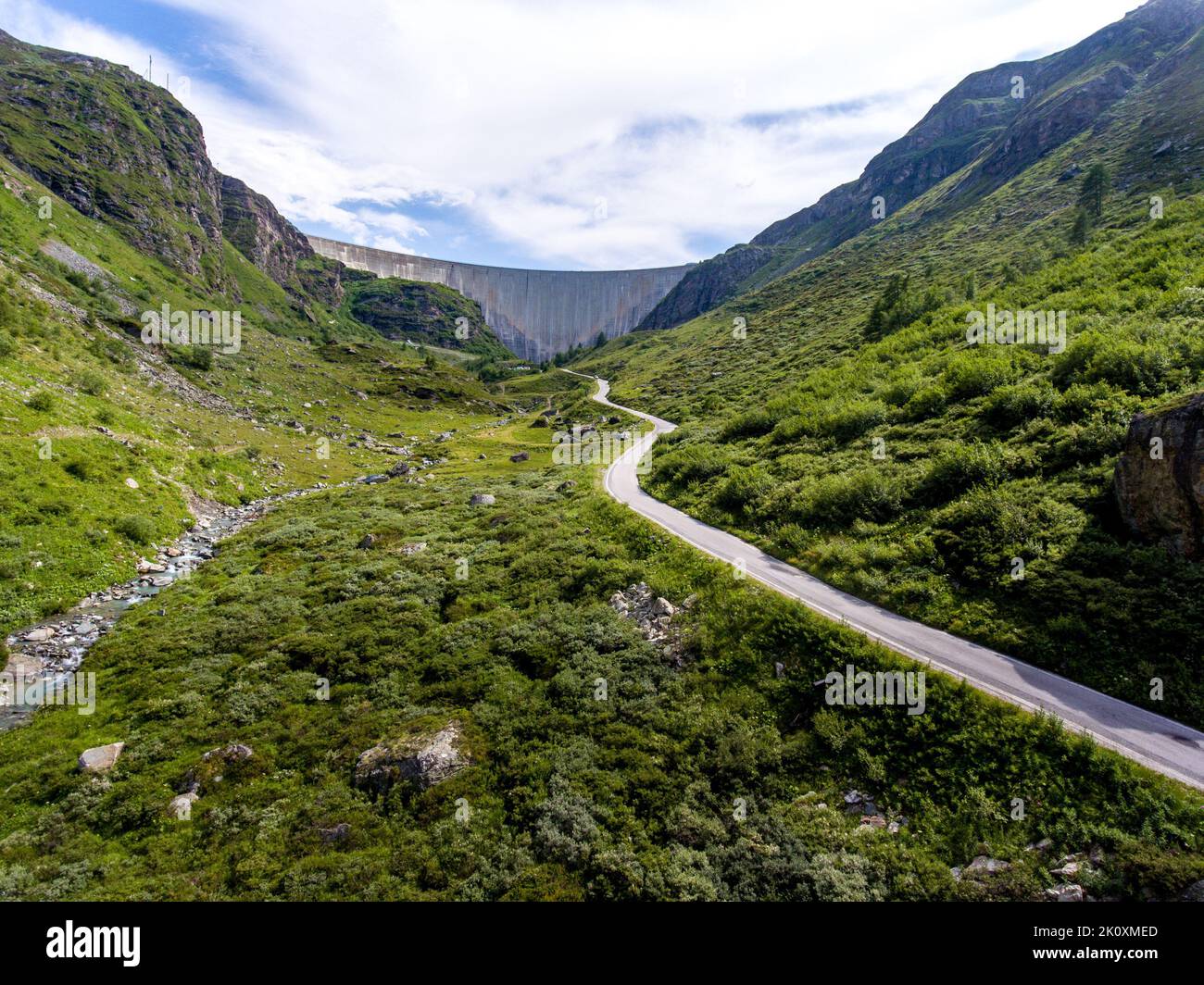 Landscape trough the Valley of Moiry and the Dam of the Moiry Lake under the Glacier of Moiry in ...