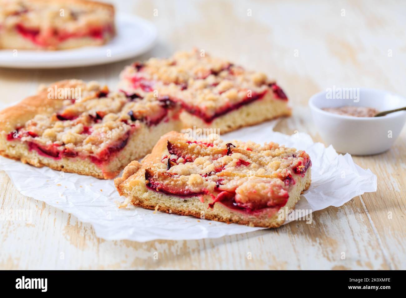 German plum cake (Zwetschgenkuchen) with yeast dough and crumbles Stock ...