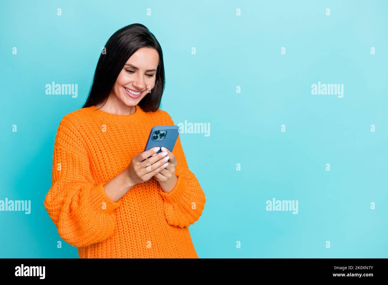 Portrait of gorgeous positive lady use telephone toothy smile empty ...