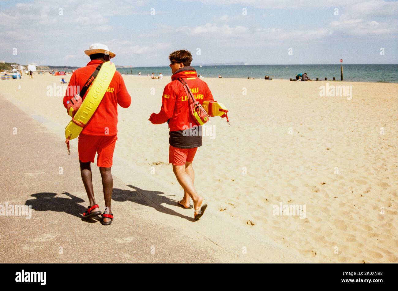 RNLI lifeguards on patrol, Bournemouth beach, Bournemouth, Dorset ...