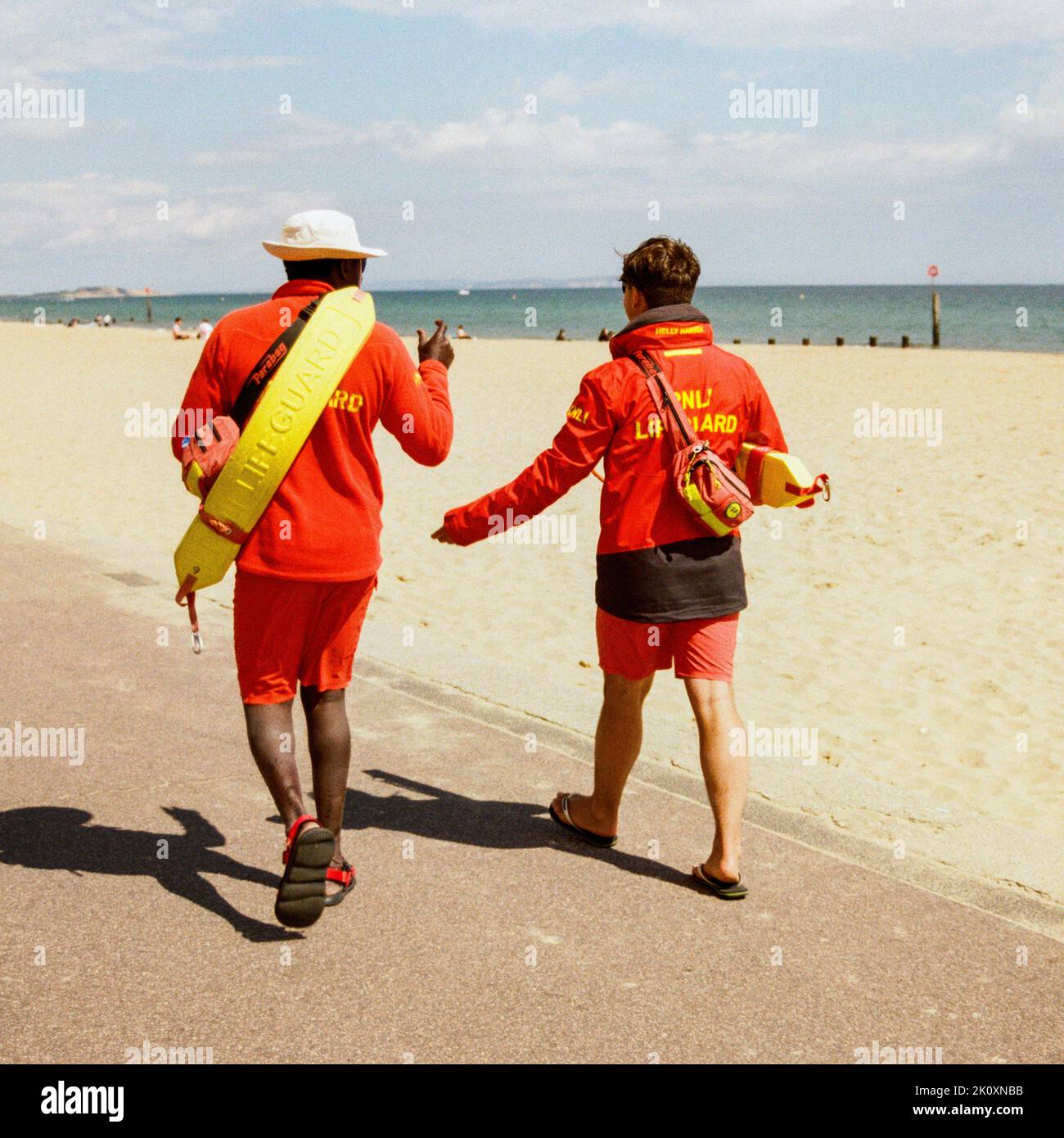 RNLI lifeguards on patrol, Bournemouth beach, Bournemouth, Dorset ...