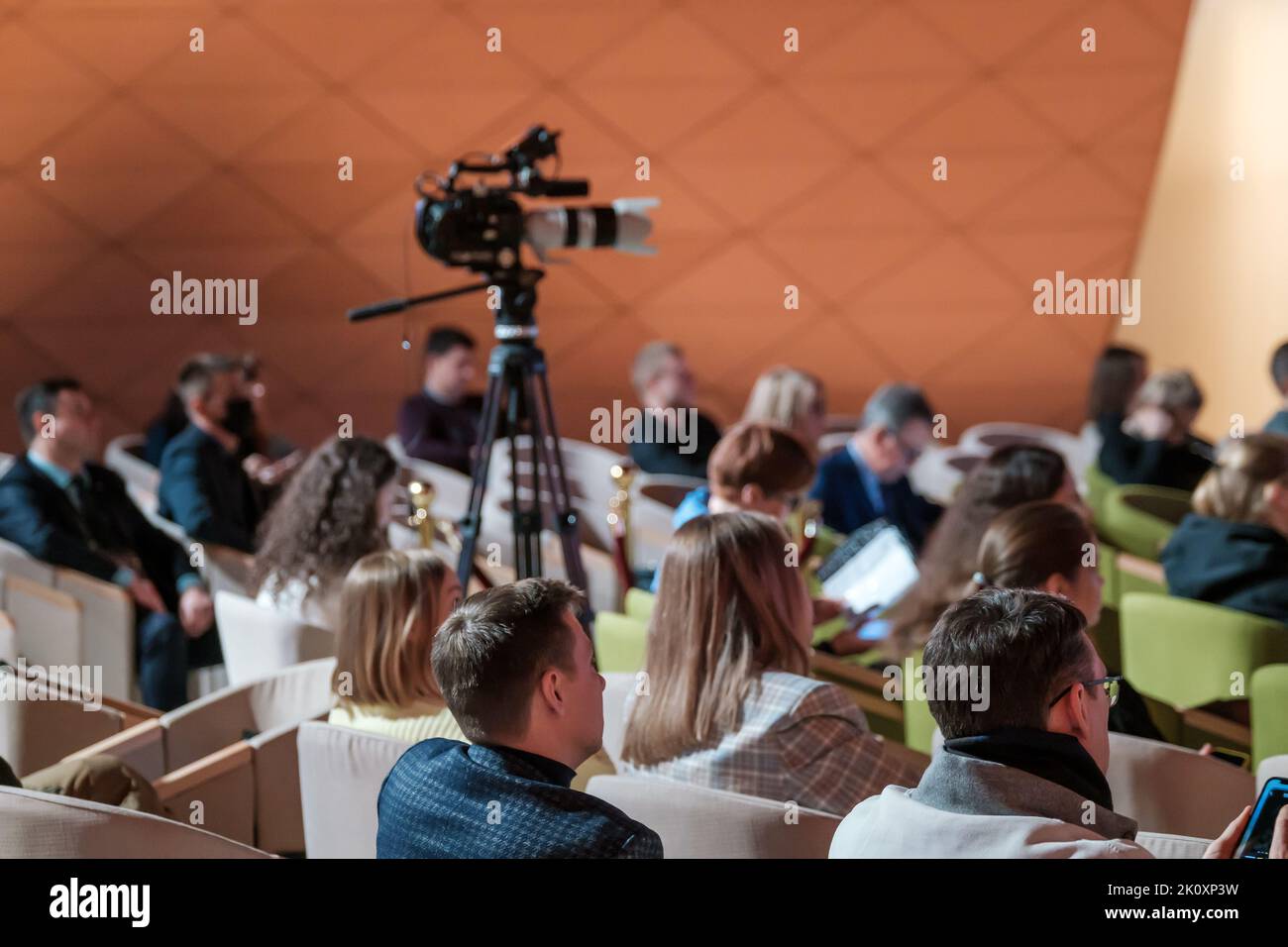 Audience watching presentation during business hi-res stock photography ...