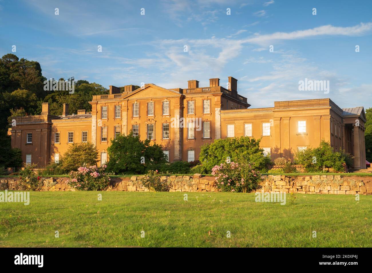 Himley Hall and Park in Staffordshire UK refllecting the last light of ...