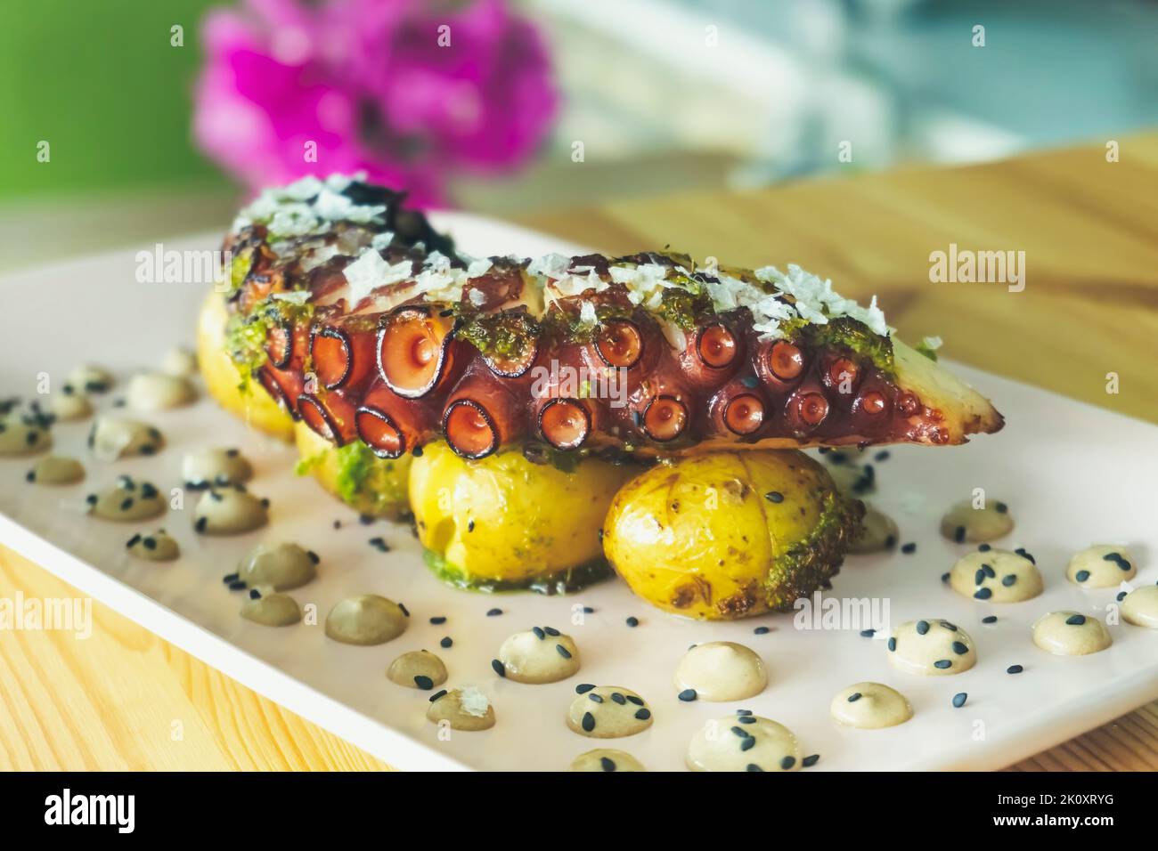 Grilled Galician octopus leg with roasted potatoes and garlic aioli ...