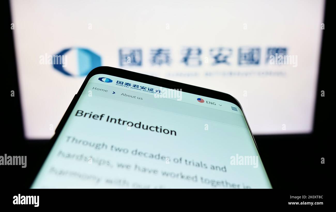 Smartphone with website of company Guotai Junan Securities Co. Ltd ...