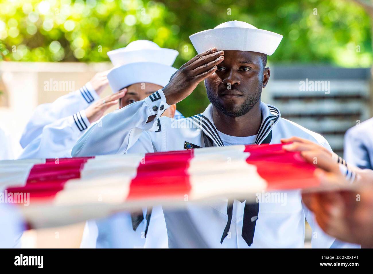 Honolulu, Hawaii, USA. 31st Aug, 2022. A U.S. Navy Sailor salutes a U.S ...