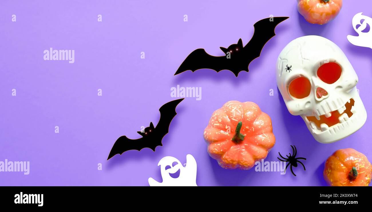 Halloween decorations on purple background. Happy Halloween concept ...