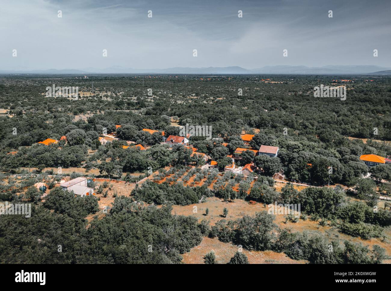 Aerial drone view over croatian farmland ans small village of Krka ...