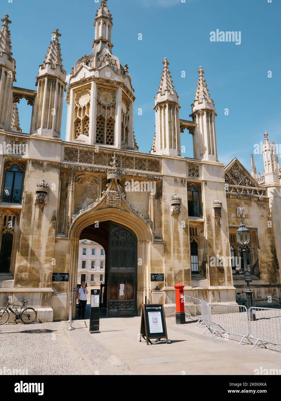 The gated entrance to King's College on King's Parade in Cambridge ...