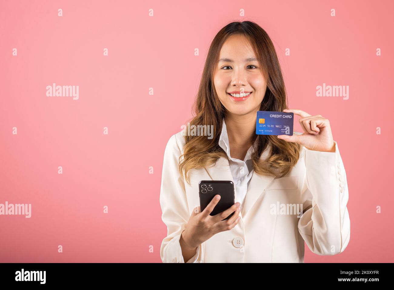 Happy Asian portrait beautiful cute young woman excited smiling hold ...