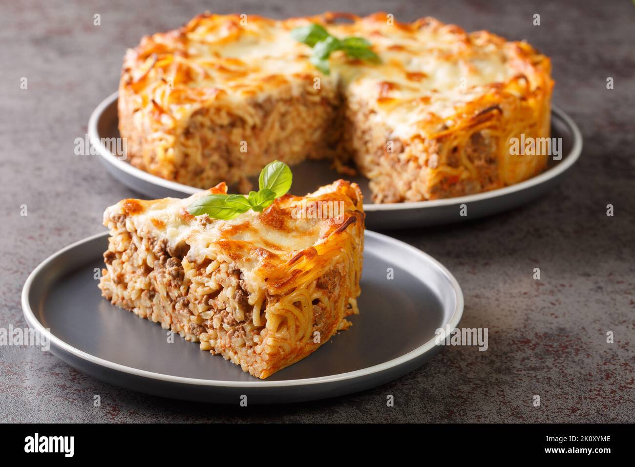 Cheesy Baked Spaghetti Pie with Ground beef, spicy and tomato sauce ...