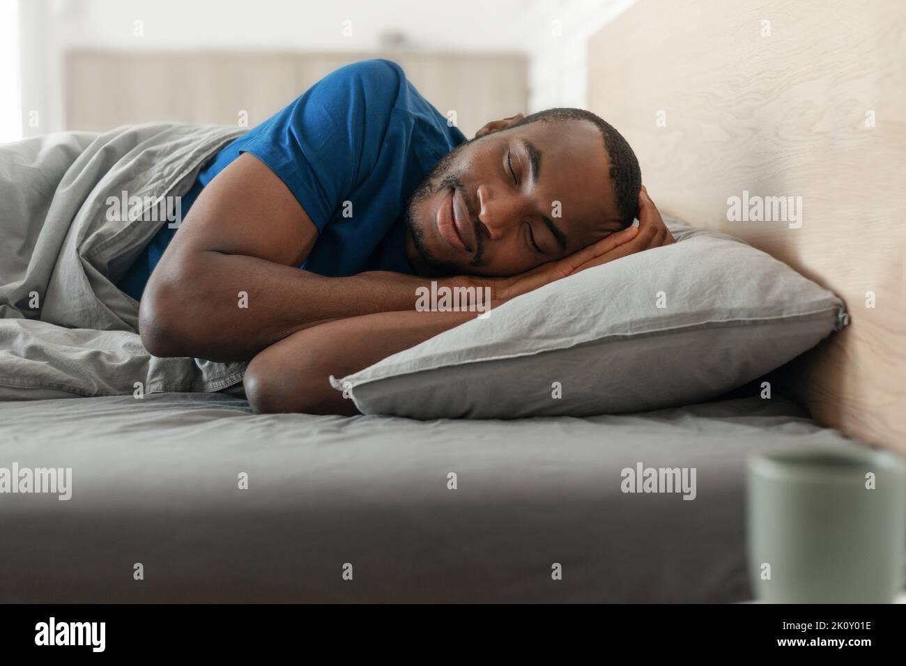 Bearded man lying in bed hi-res stock photography and images - Alamy