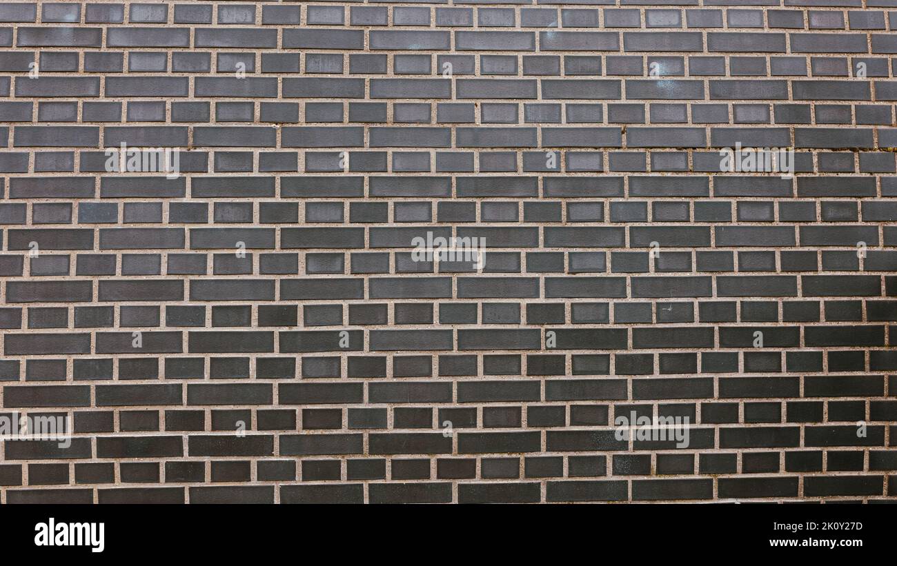 Dark clinker brick wall background Stock Photo - Alamy