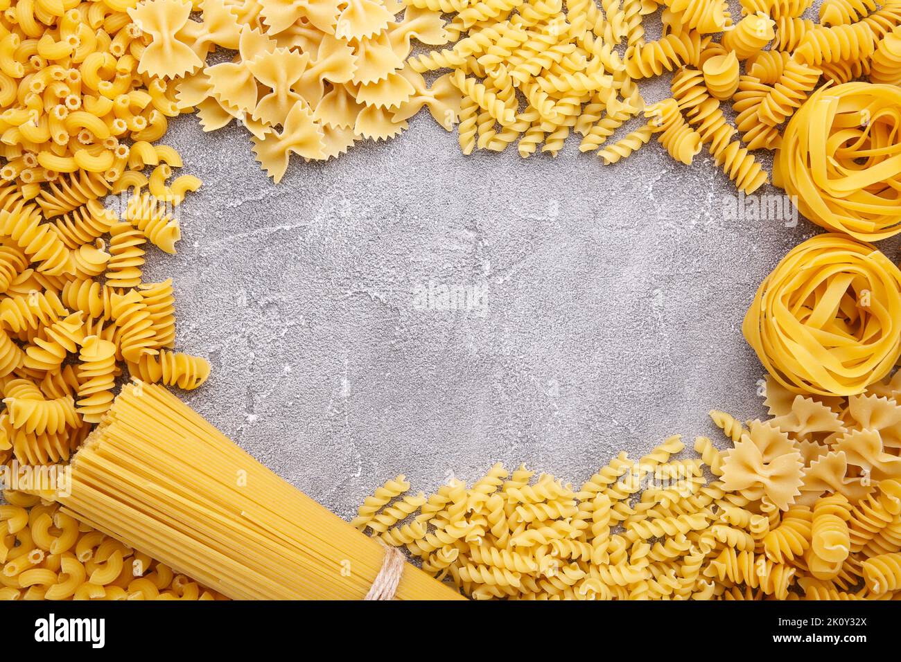 Delicious mixed pasta on grey background with copy space Stock Photo ...