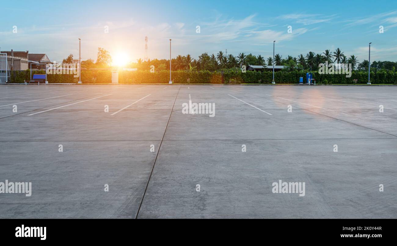 Empty parking lot and blue sky background. Parking outdoor in public ...