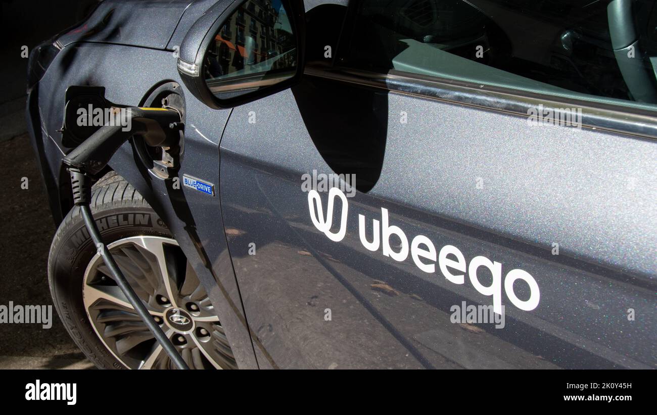 Paris, France: Electric car being recharged at a station of the Ubeeqo ...