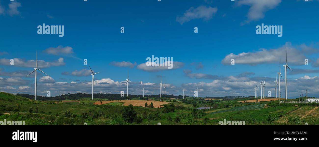 Countryside landscape of hills and turbines field with blue sky cloud ...