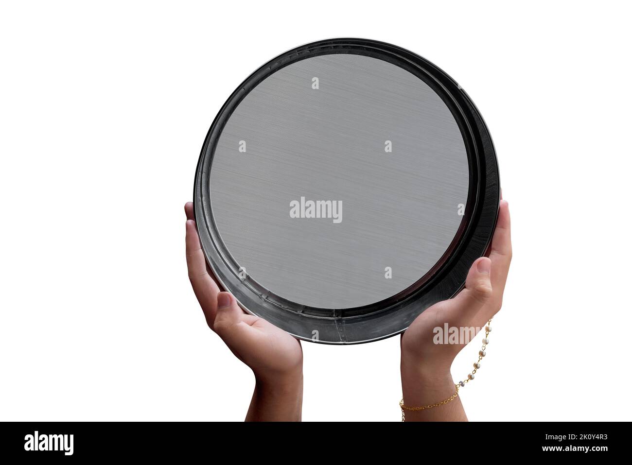 Woman hand holding Karwa Chauth strainer for the Karwa Chauth ...