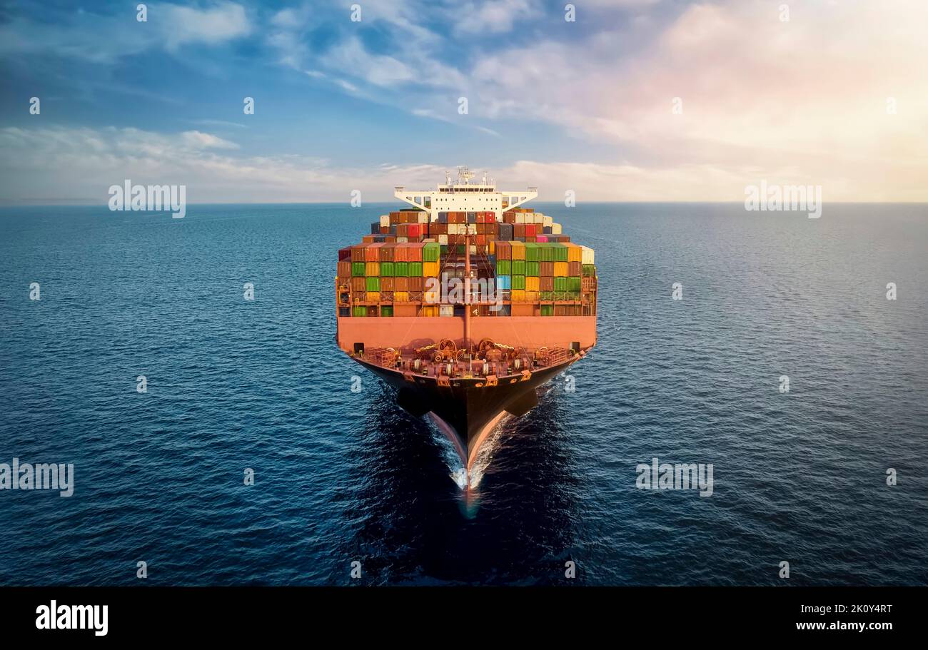 Aerial front view of a large, loaded container cargo vessel Stock Photo ...