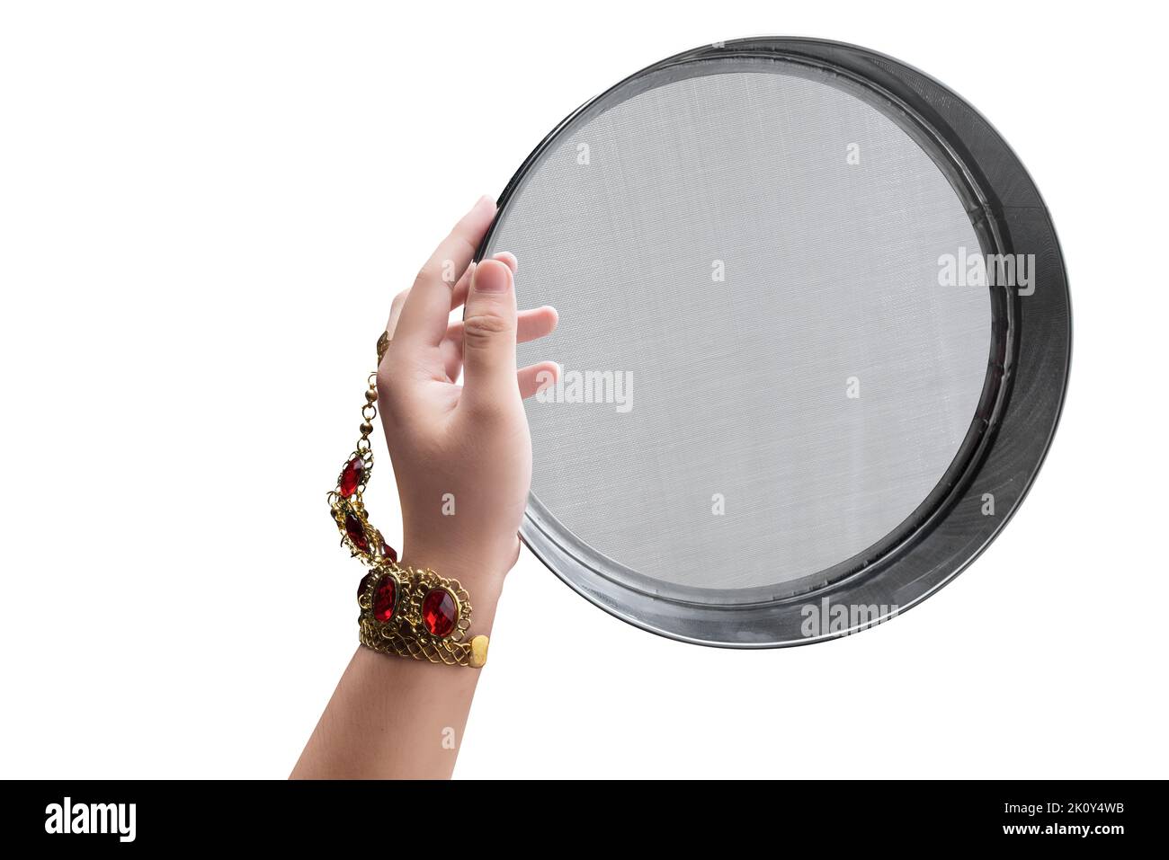 Woman hand holding Karwa Chauth strainer for the Karwa Chauth ...