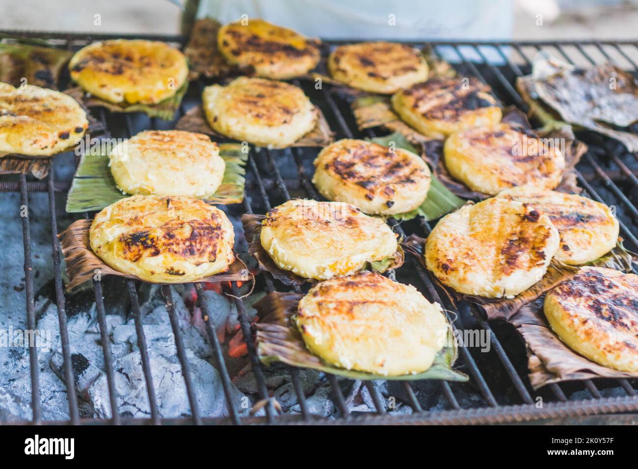View of arepas in a barbecue. Colombian food Stock Photo - Alamy