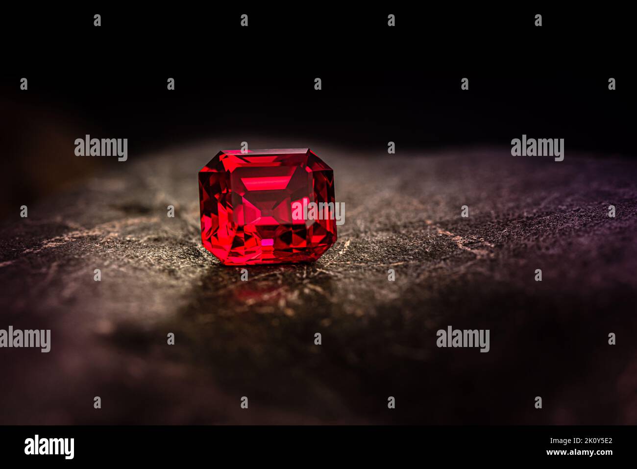 Red Brilliant. Luxury Precious Red Gemstone on Dark Natural Stone Stock ...