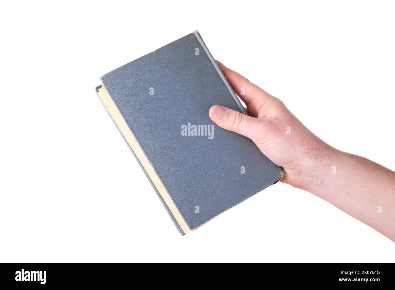 Hand holding old book isolated on white background Stock Photo - Alamy