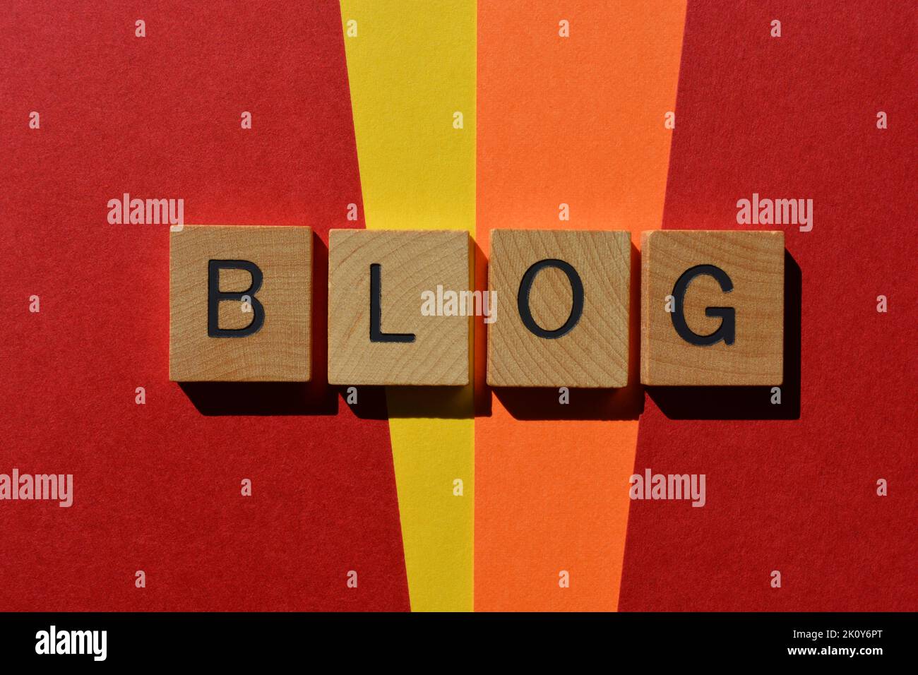 Blog, word in wooden alphabet letters isolated on colourful background ...