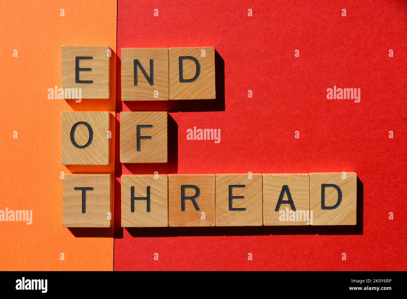 E O T, abbreviation for End of Thread in wooden alphabet letters ...